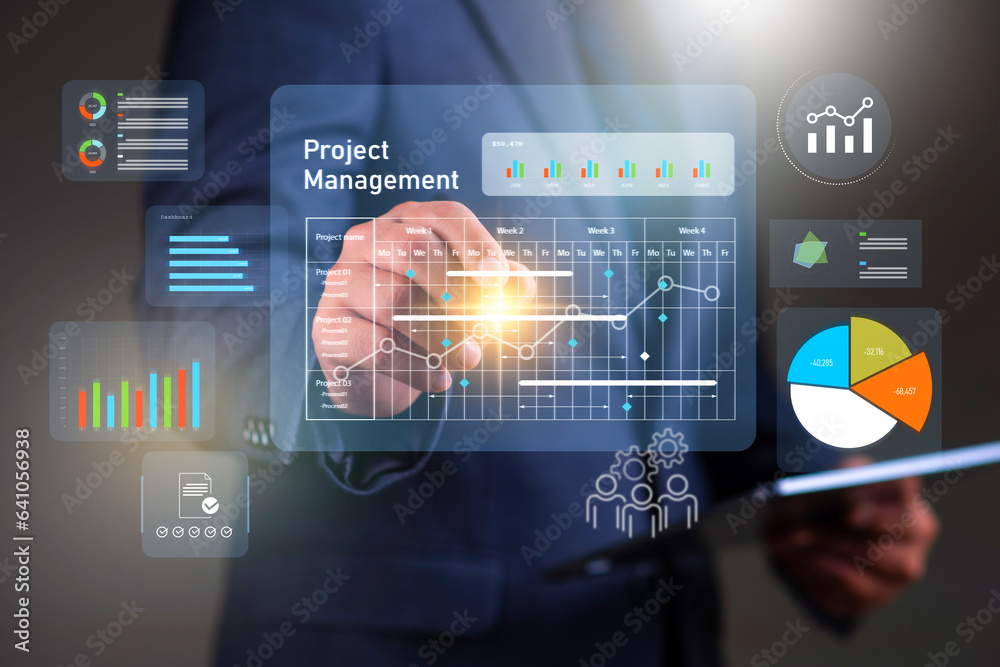 Project management concept, businessman working with schedule plan to ...