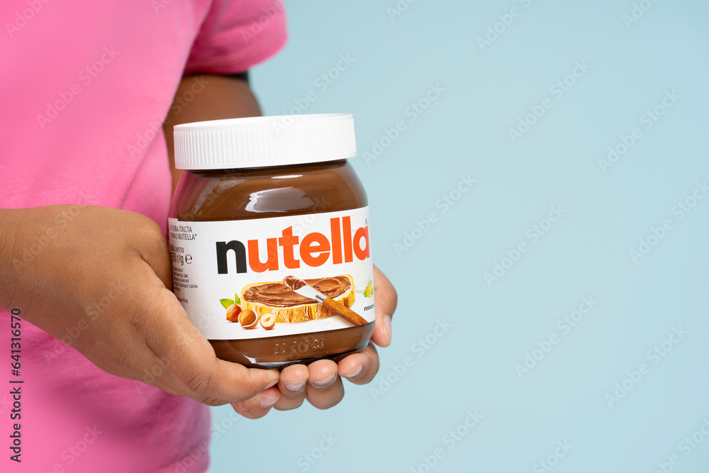 Kyiv, Ukraine - August 16th 2023: Female hand holding jar of tasty ...