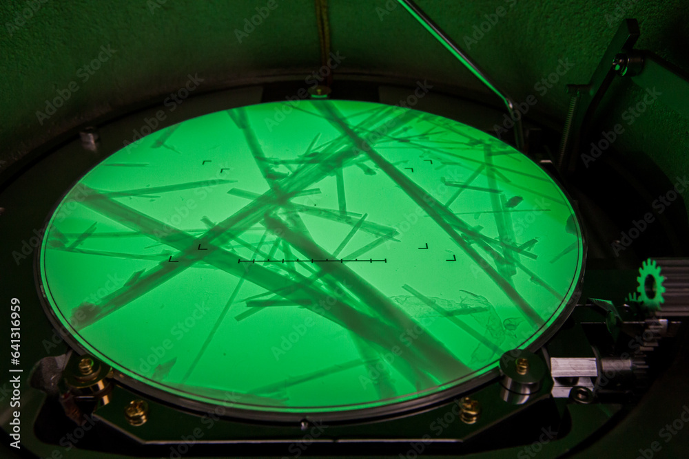 Actinolite fibers (asbestos variety) seen on the fluorescent screen of ...