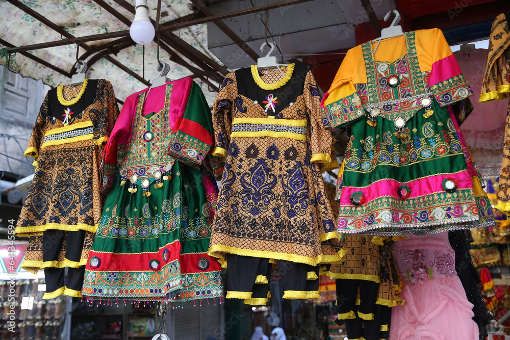 Traditional national dresses are on market in Peshawar city, Pakistan ...
