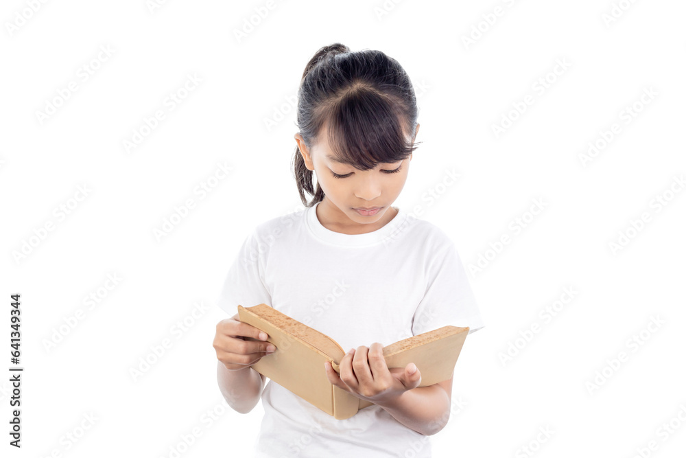 Lovely little girl standing and reading book isolated on white ...