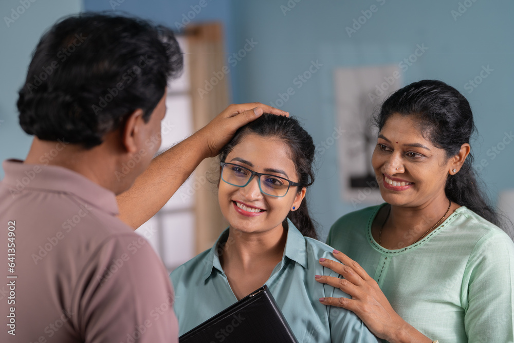 proud caring indian father blessing his first day office going daughter ...