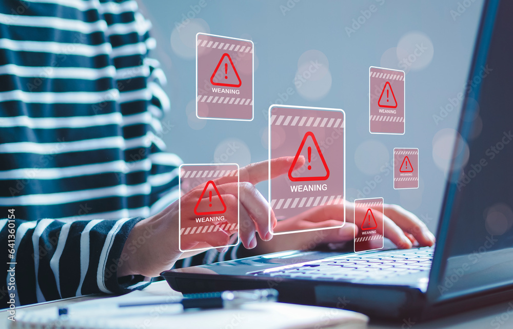 hacked system notification on laptop Cyber attacks on computer networks ...