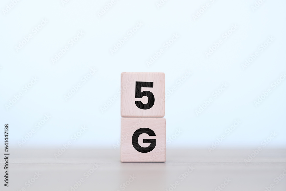 5G word on block cubes lined vertically, network or communication idea ...