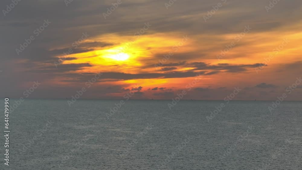 Each gentle undulation of the water's surface captures and reflects the ...