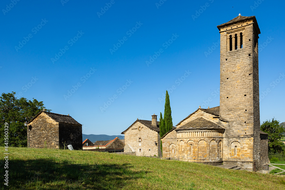 Well-preserved Romanesque stone Church of San Pedro with robust bell ...