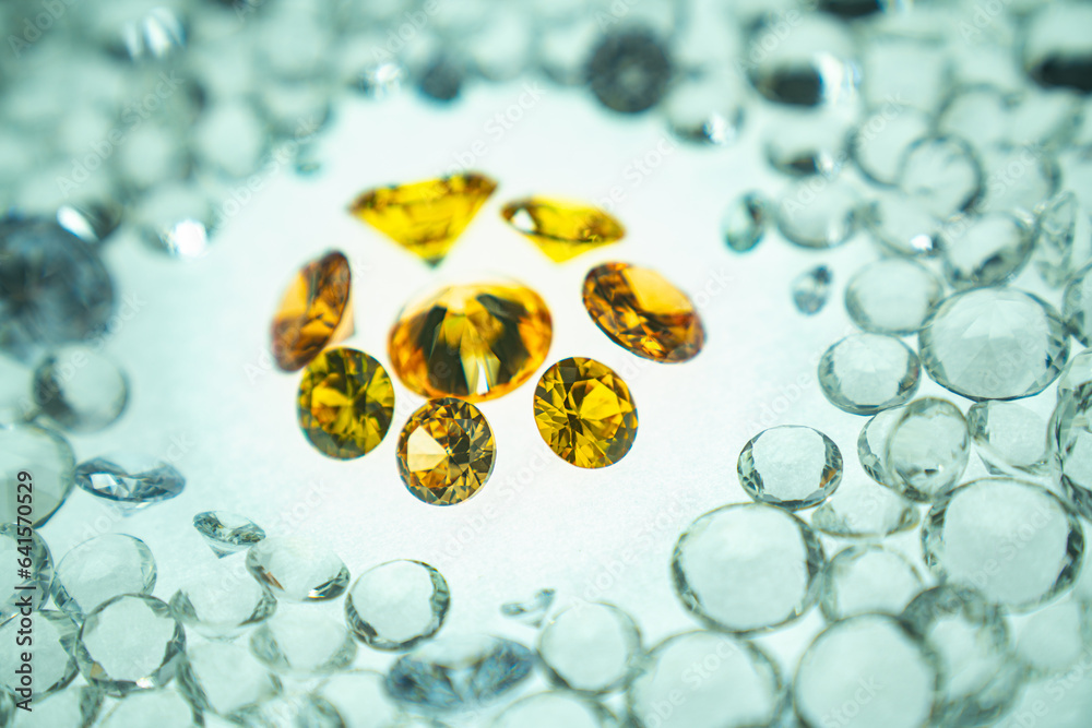 ..A group of yellow diamonds arranged in the middle of white diamonds ...