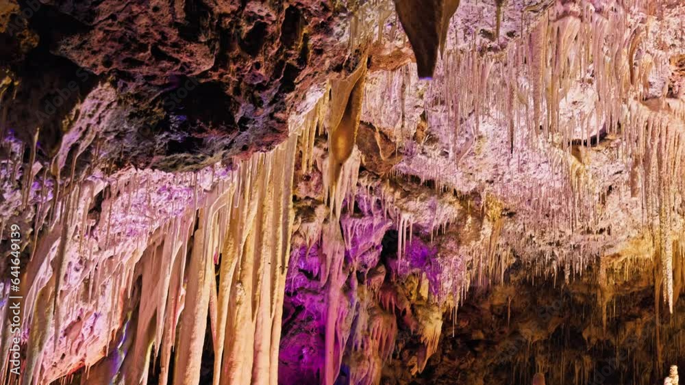 Underground cave with distinct rocky formations of stalactites and ...