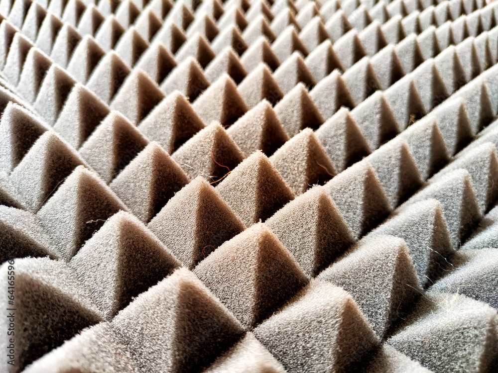 Foam soft texture and background with lots of pyramids, triangles ...