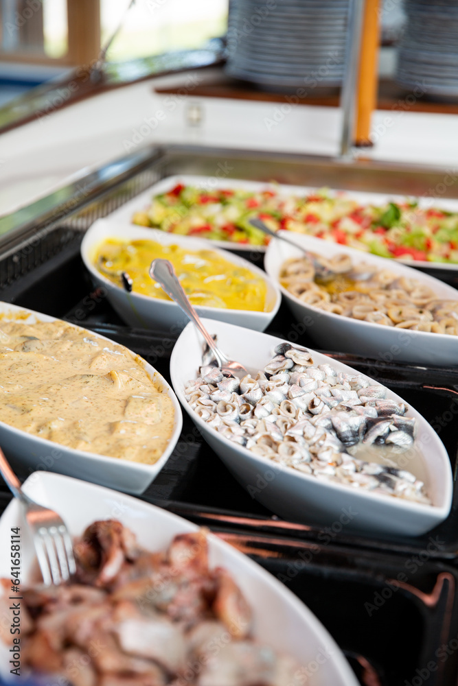 Variety dishes served buffet dinner. Mediterranean ketogenic diet, fish ...