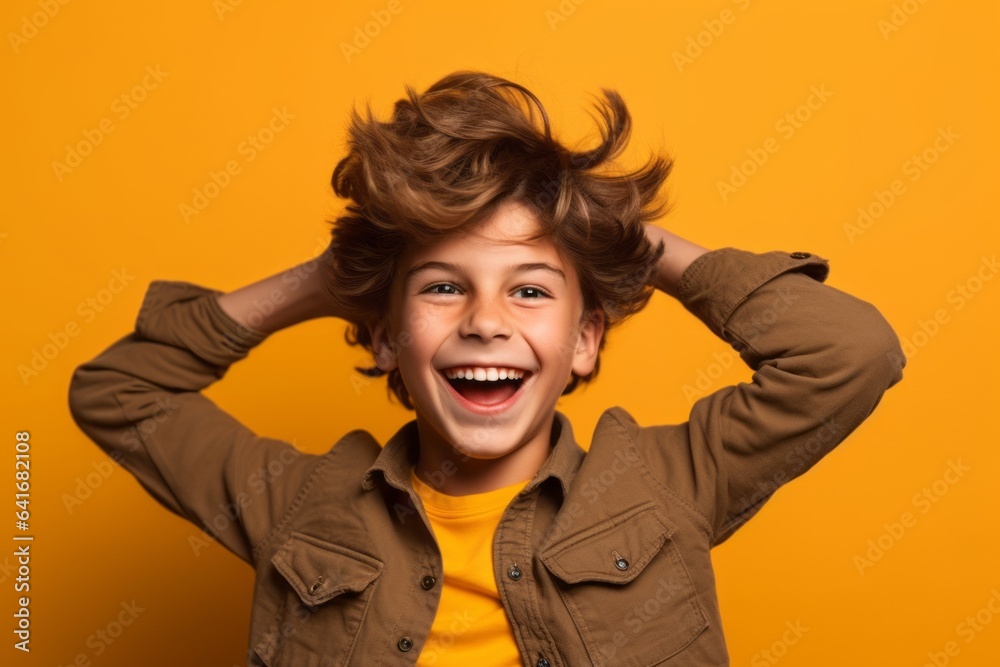 Lifestyle portrait photography of a grinning kid male scratching head ...