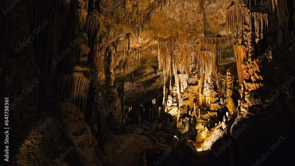 Vídeo do Stock: Limestone Underground Cave with stalactites and ...