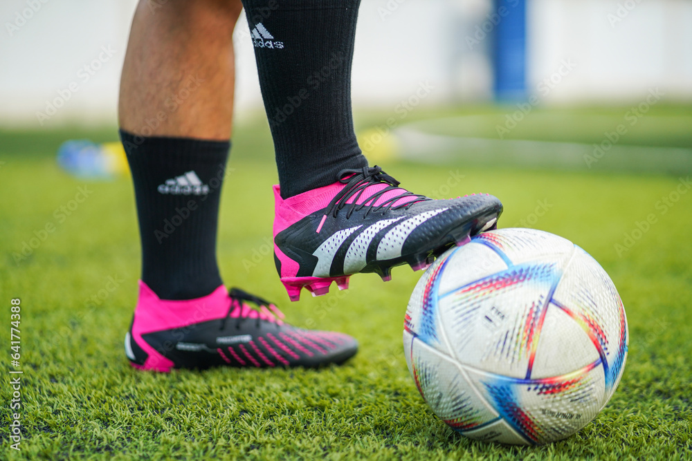Thailand - 26 August 2023: A football player is wears Adidas "Predator ...