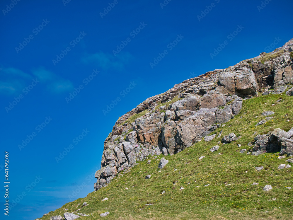 Rock outcrop on the south of the island of Vatersay, Outer Hebrides ...