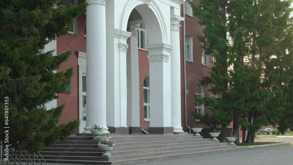 Establishing shot of part of four storey classic style school building ...