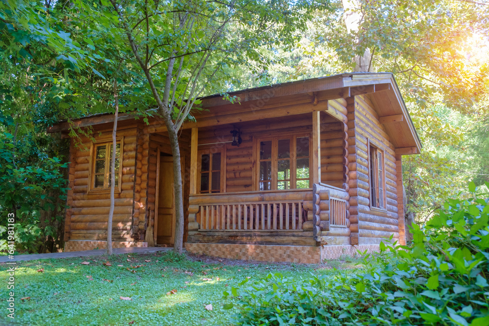 Beautiful wooden house or hut made with wood logs. Wooden hut in the ...