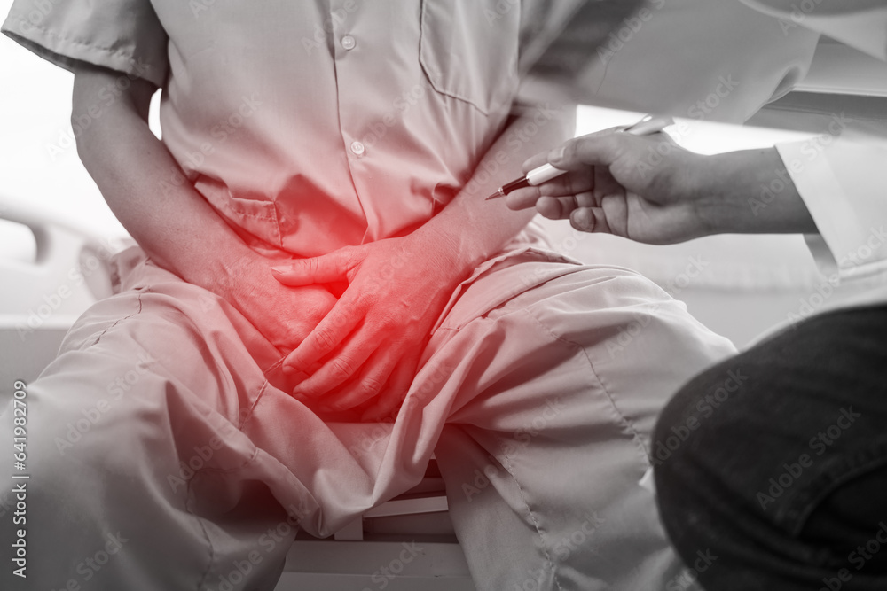 Urinary tract cancer specialists examine patients for prostate cancer ...