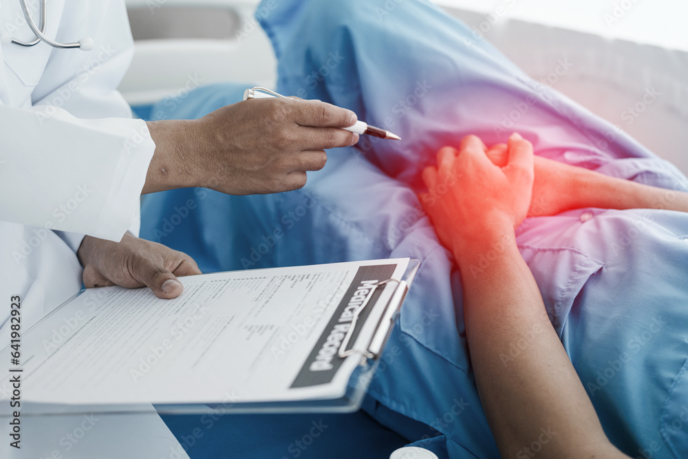 Urinary tract cancer specialists examine patients for prostate cancer ...