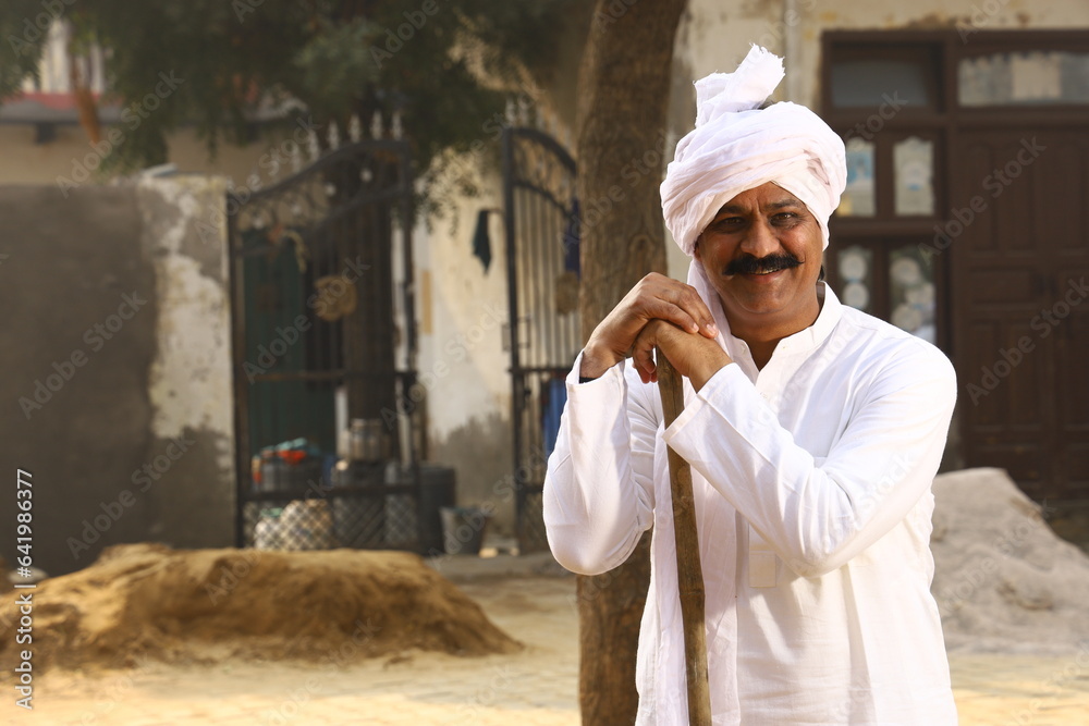Mid-Aged man in Rural Environment wearing kurta-pajama which is ...