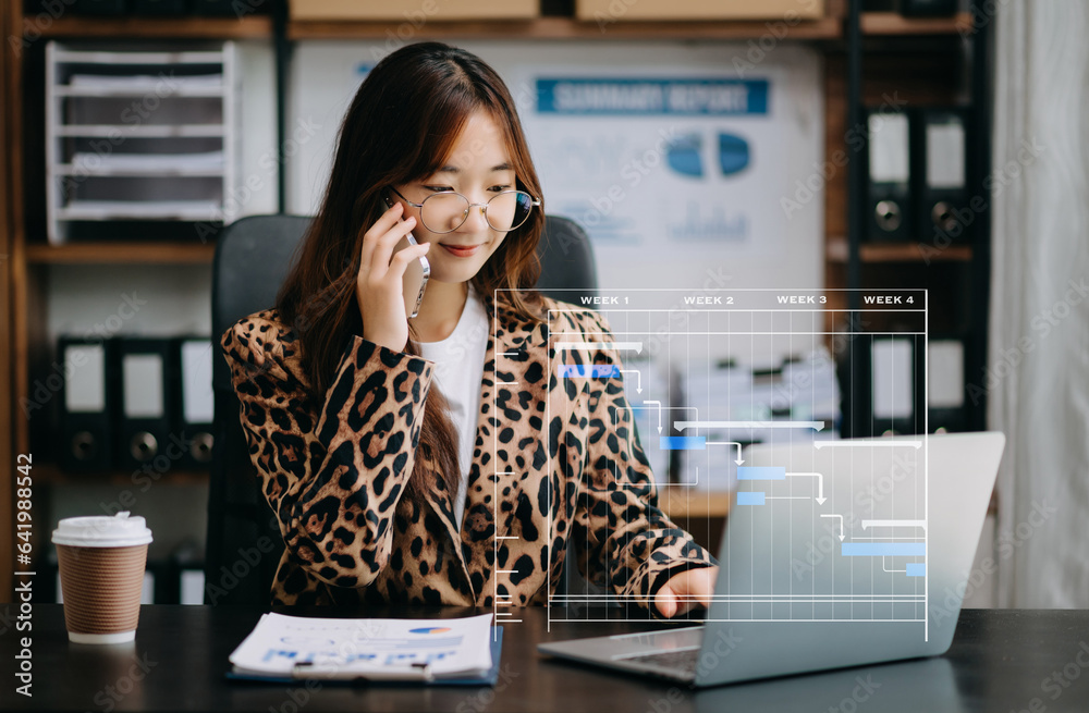 Project manager working and update tasks with milestones progress ...