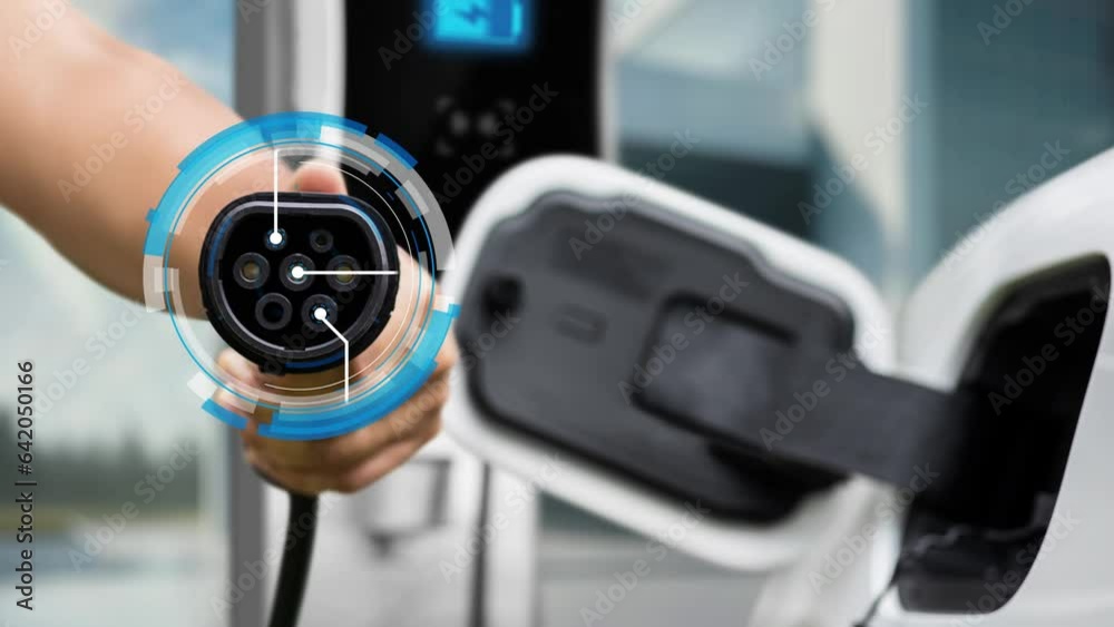 Focus EV charger pointing in front of camera display futuristic smart ...