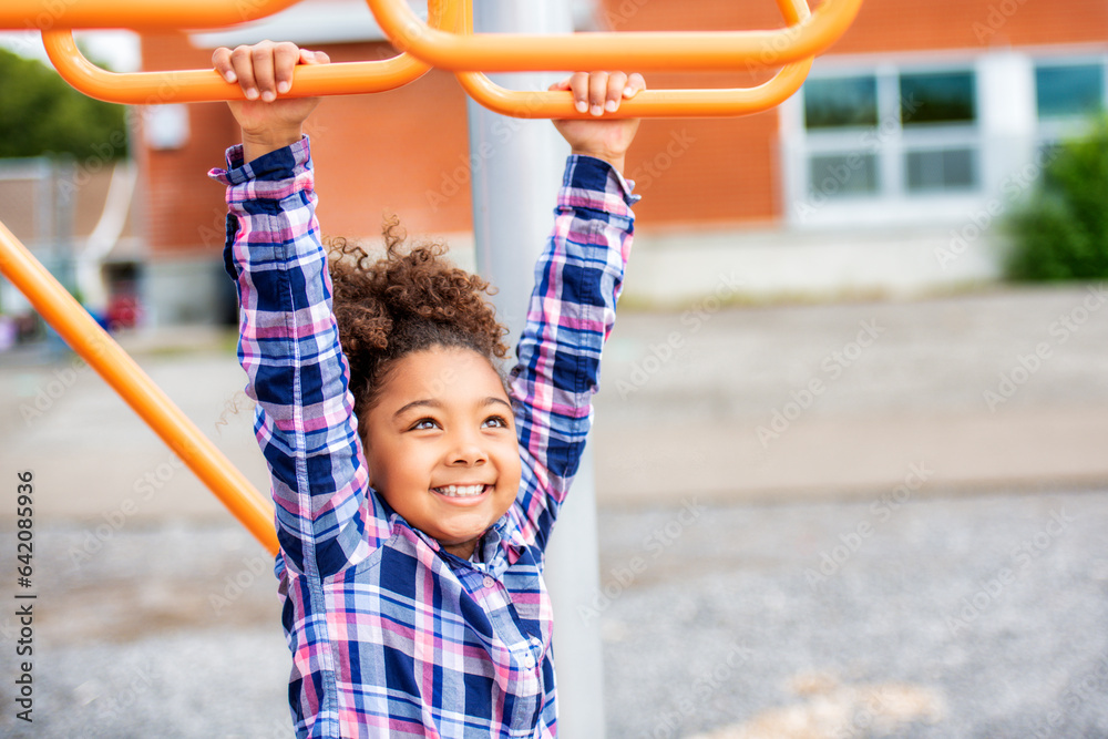 Cute American little kid girl having fun while playing on the ...