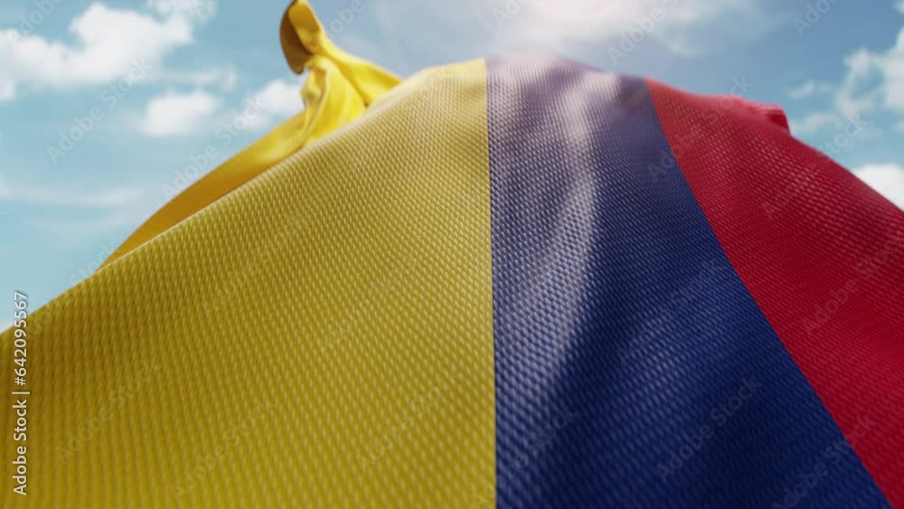 Wavy flag of Colombia blowing in the wind in slow motion. Waving ...
