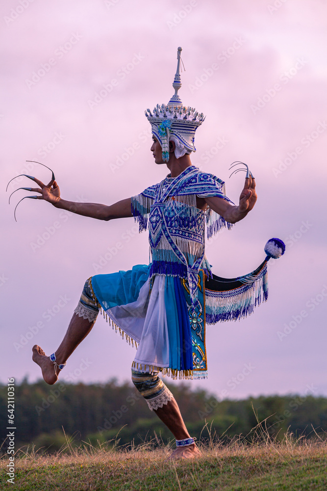 Nora performs dance moves in the field at sunset.beautiful sky ...