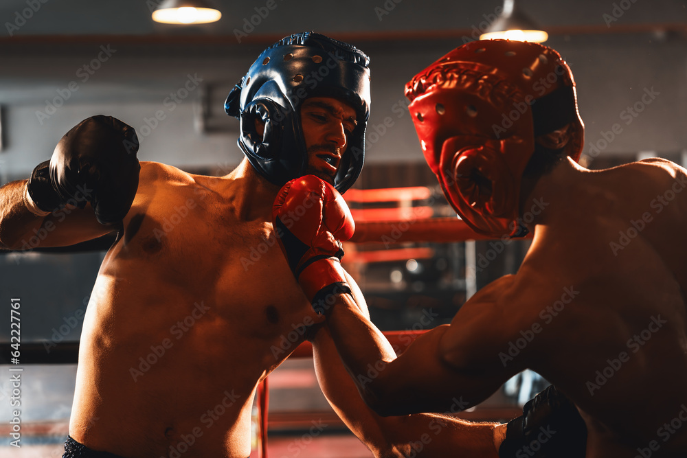 Two athletic and muscular body boxers with safety helmet or boxing head ...