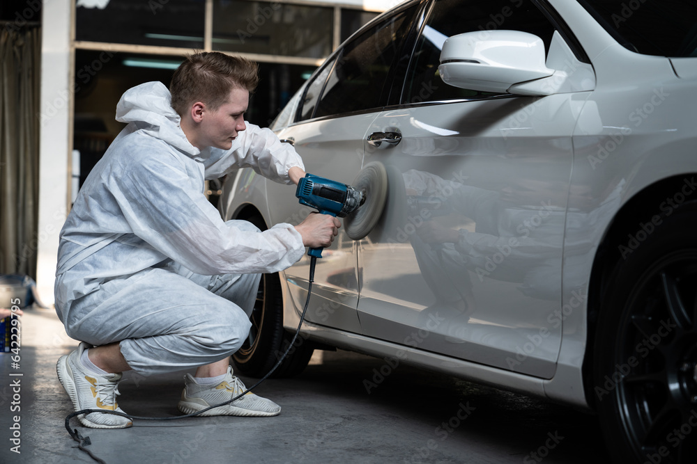 Automotive repair shop, concept of car detailing and polishing by ...