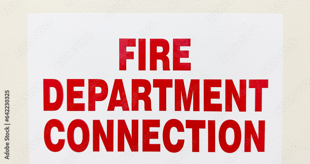 fire department sign guides the way to the fire exit, a vital symbol of ...