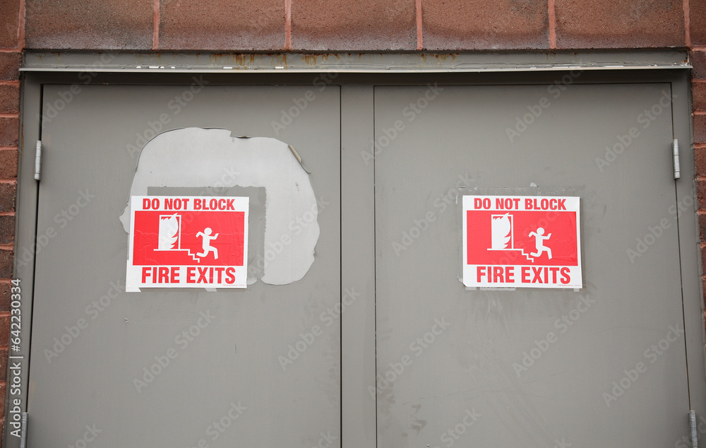 fire department sign guides the way to the fire exit, a vital symbol of ...