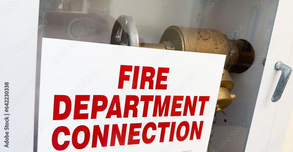 fire department sign guides the way to the fire exit, a vital symbol of ...