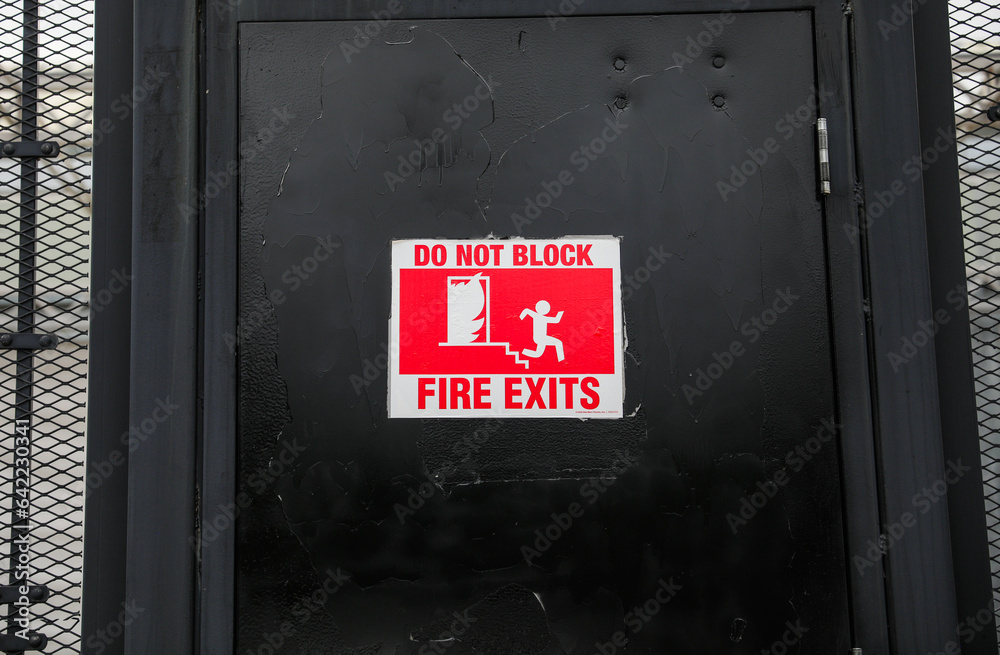 fire department sign guides the way to the fire exit, a vital symbol of ...