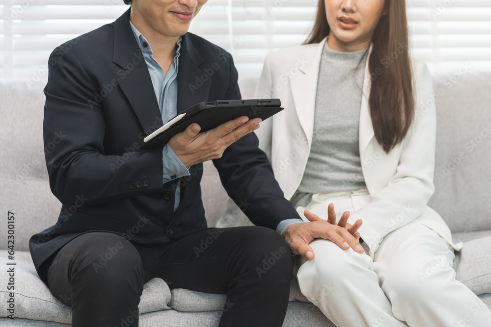 Unhappy asian young employee, business woman defending hand of ...