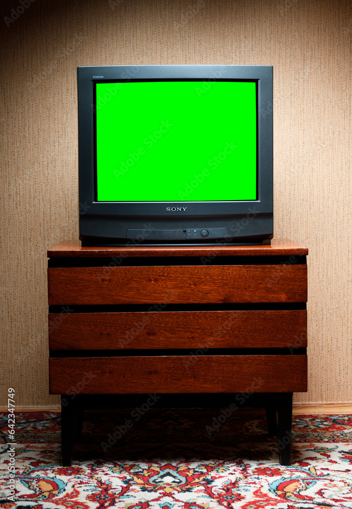Vintage green screen tv on wooden antique cabinet, old house design ...