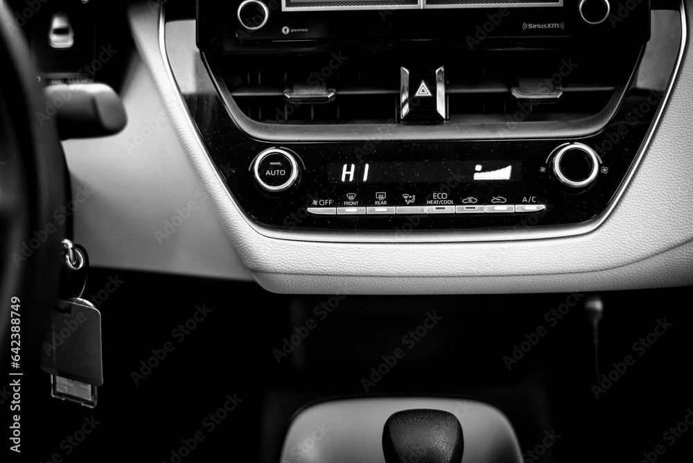 Car steering wheel with key and modern climate control dash high ...