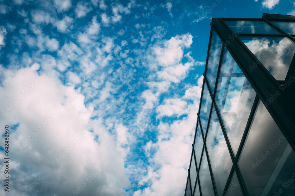Transparent glass walls of office buildings. A modern office building ...
