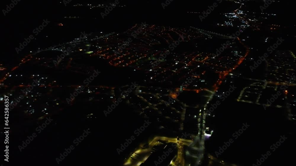 City lights, a tour over a small town in Brazil at night showing the ...