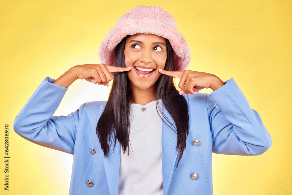 Fashion, smile and face of Indian woman on yellow background with silly ...