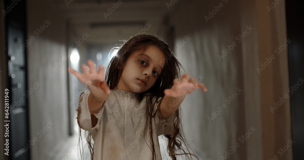 Little caucasian girl in ghost white sundress costume for halloween ...