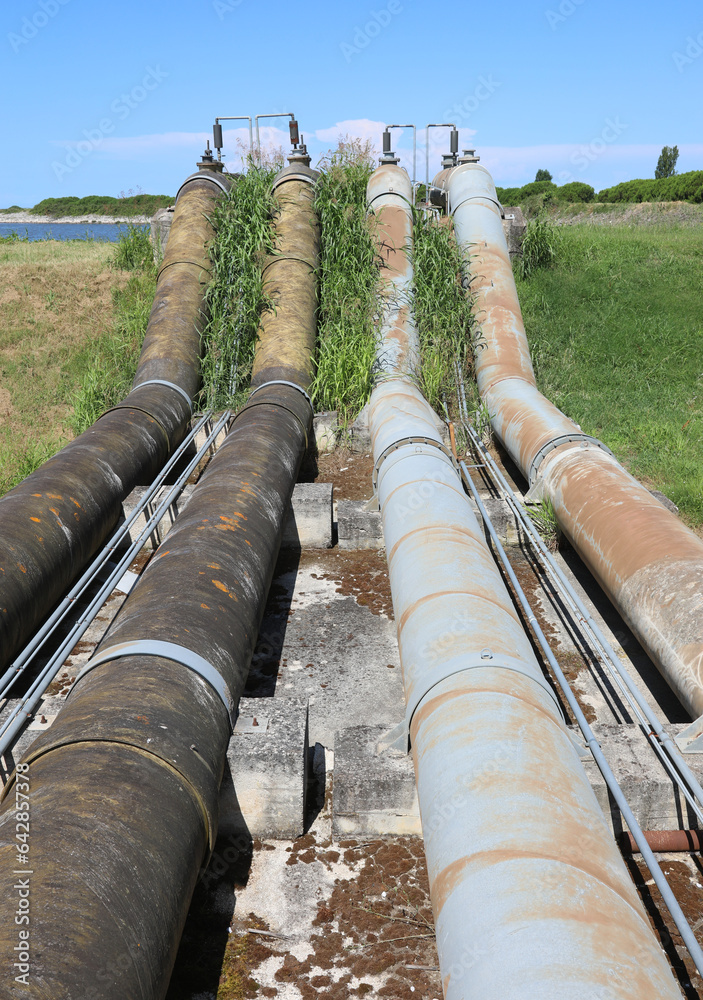 big pipes of the dewatering pumps for the reclamation of marshy water ...