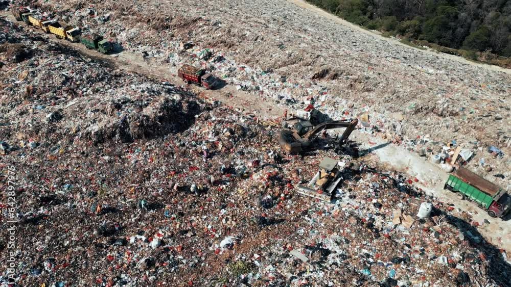 Large Waste Dump and Trash Truck with Garbage in Aerial Top View. Big ...