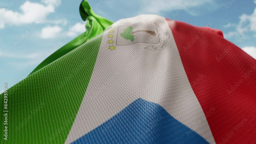 Wavy flag of Equatorial Guinea blowing in the wind in slow motion ...