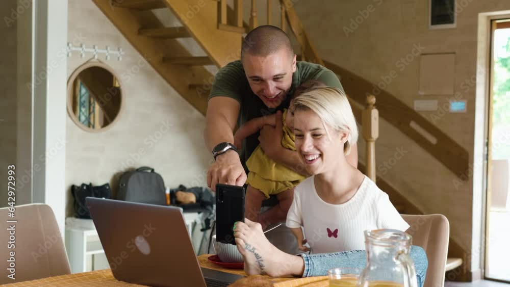 Young woman with Phocomelia syndrome holding a mobile phone with her ...