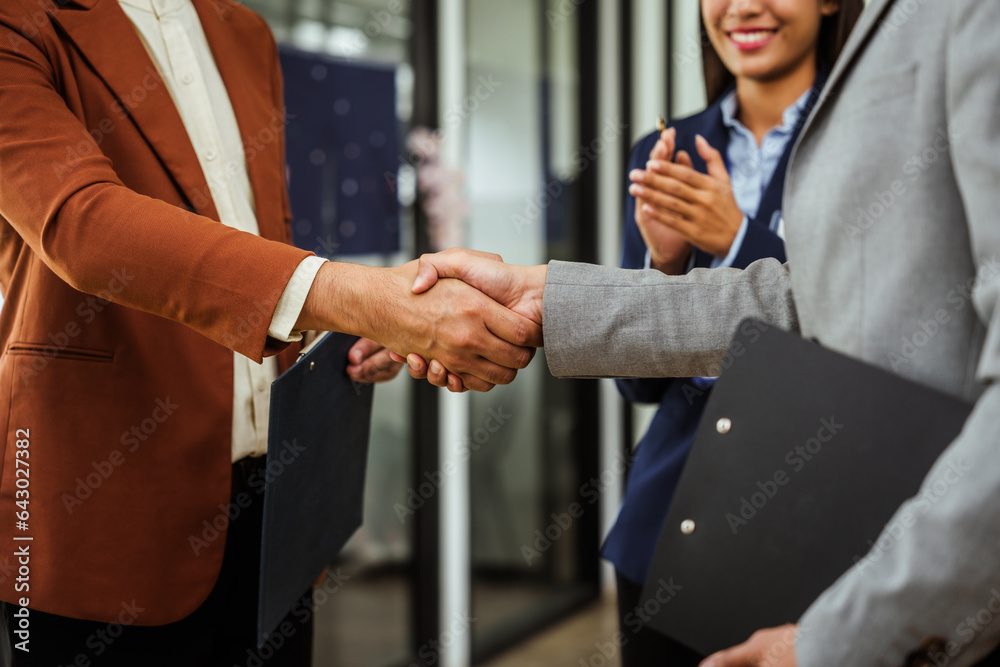 Shaking hands, Opinion insights sharing organization meeting of Asian ...