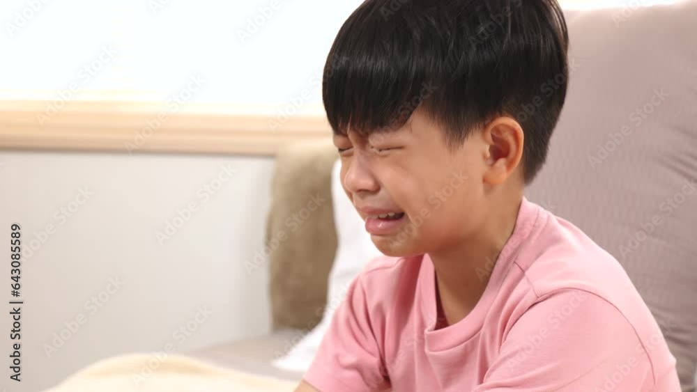 Asian adorable boy crying with no tears upset want to play game but not ...