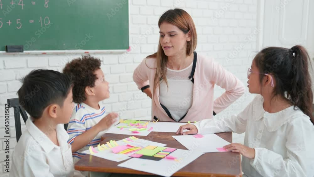 Multi-ethnic students of different nationalities learning together in a ...