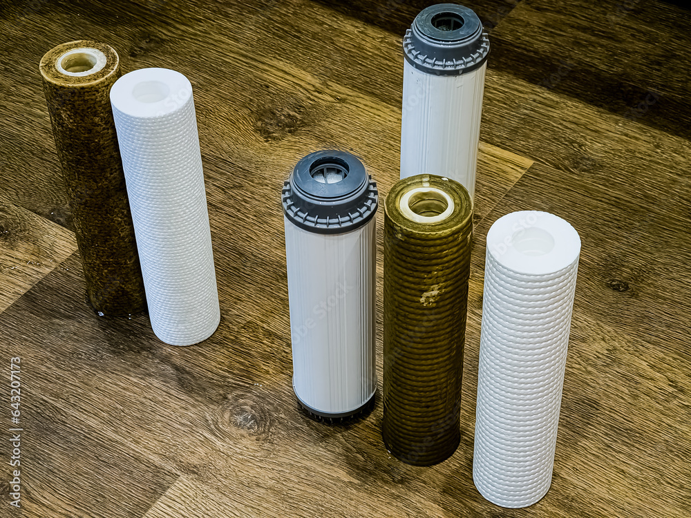 Foto de Used water filters with traces of dirt, clay and impurities and ...