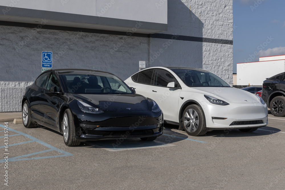 Tesla EV electric vehicles on display. Tesla models include the Model 3 ...